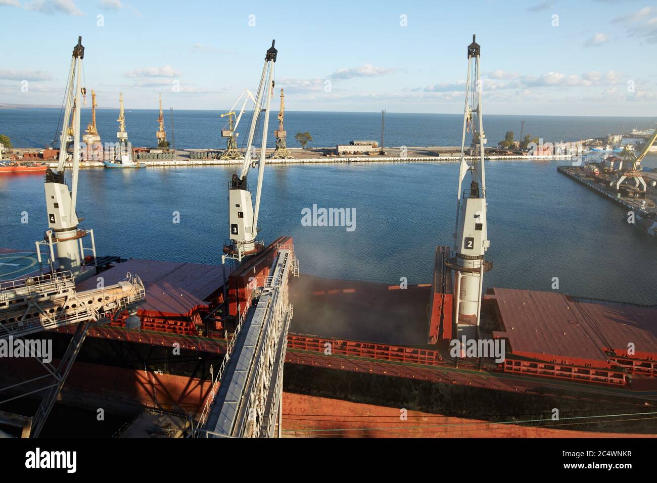 Big grain terminal at seaport. Cereals bulk transshipment from road ...