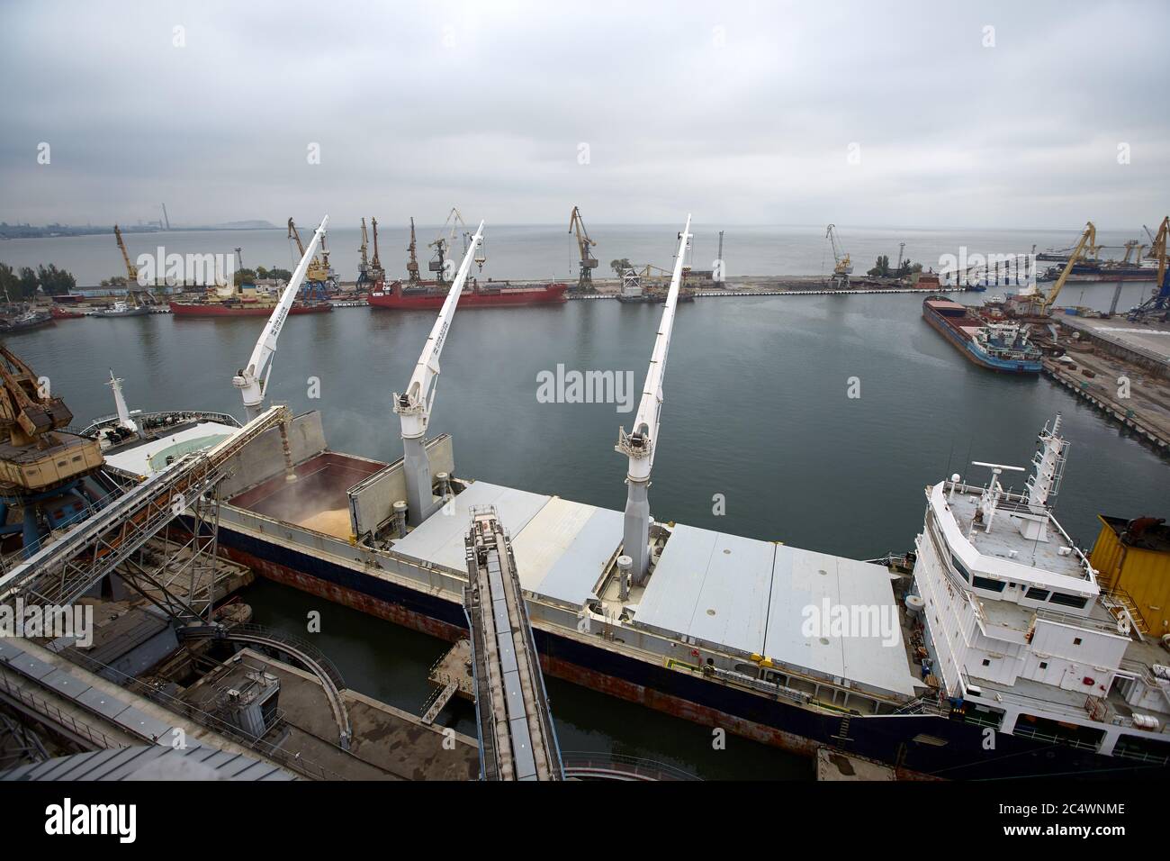 Big grain terminal at seaport. Cereals bulk transshipment from road ...