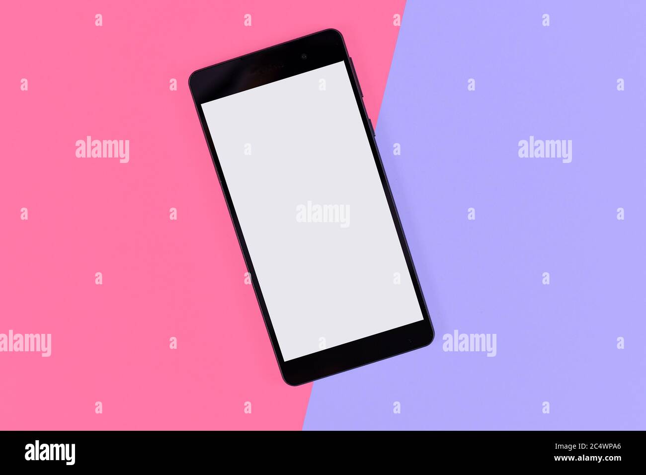 Flat lay with blank black smart phone with empty screen on pink and ...