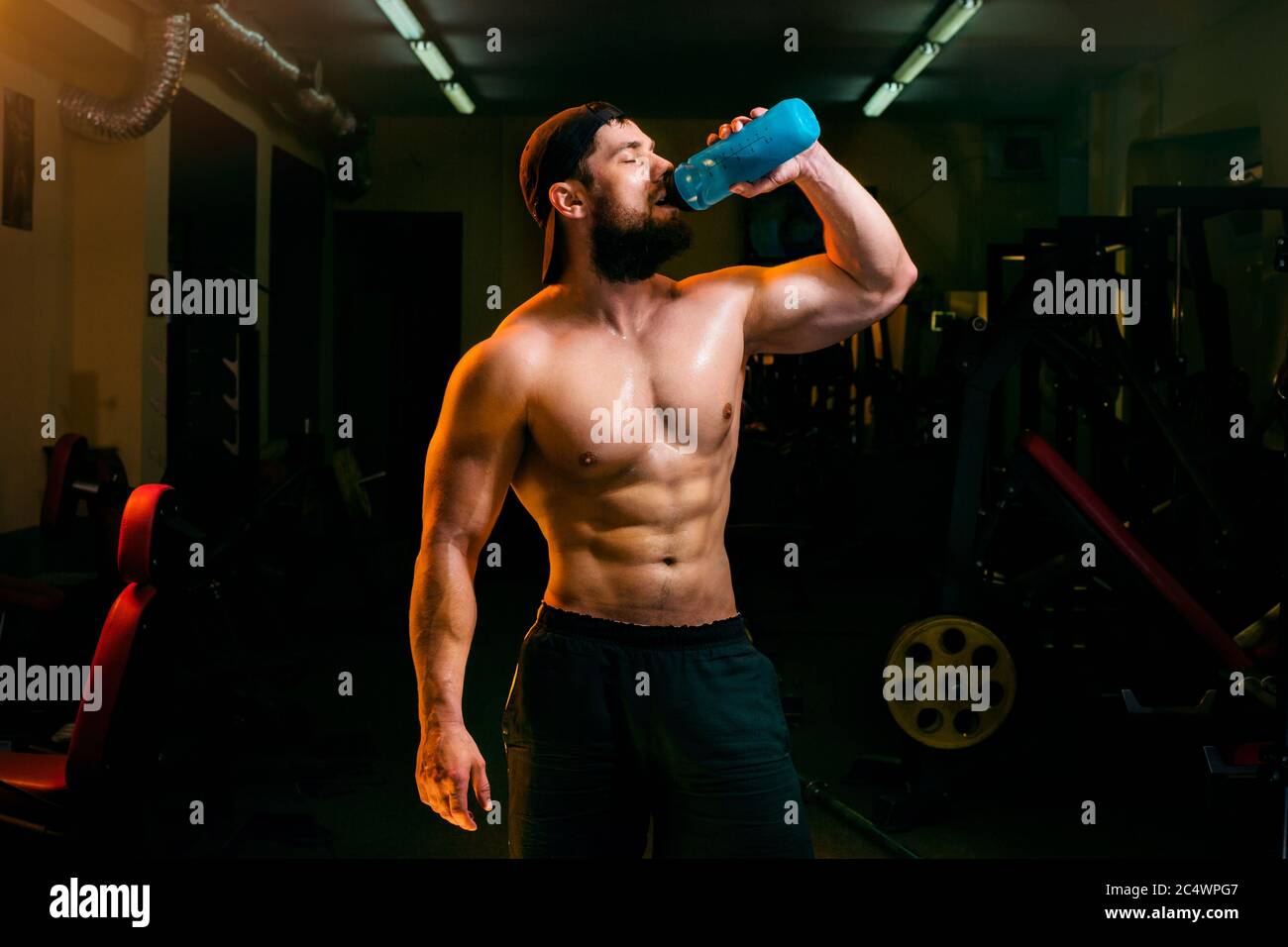 man in the gym with shaker Stock Photo - Alamy