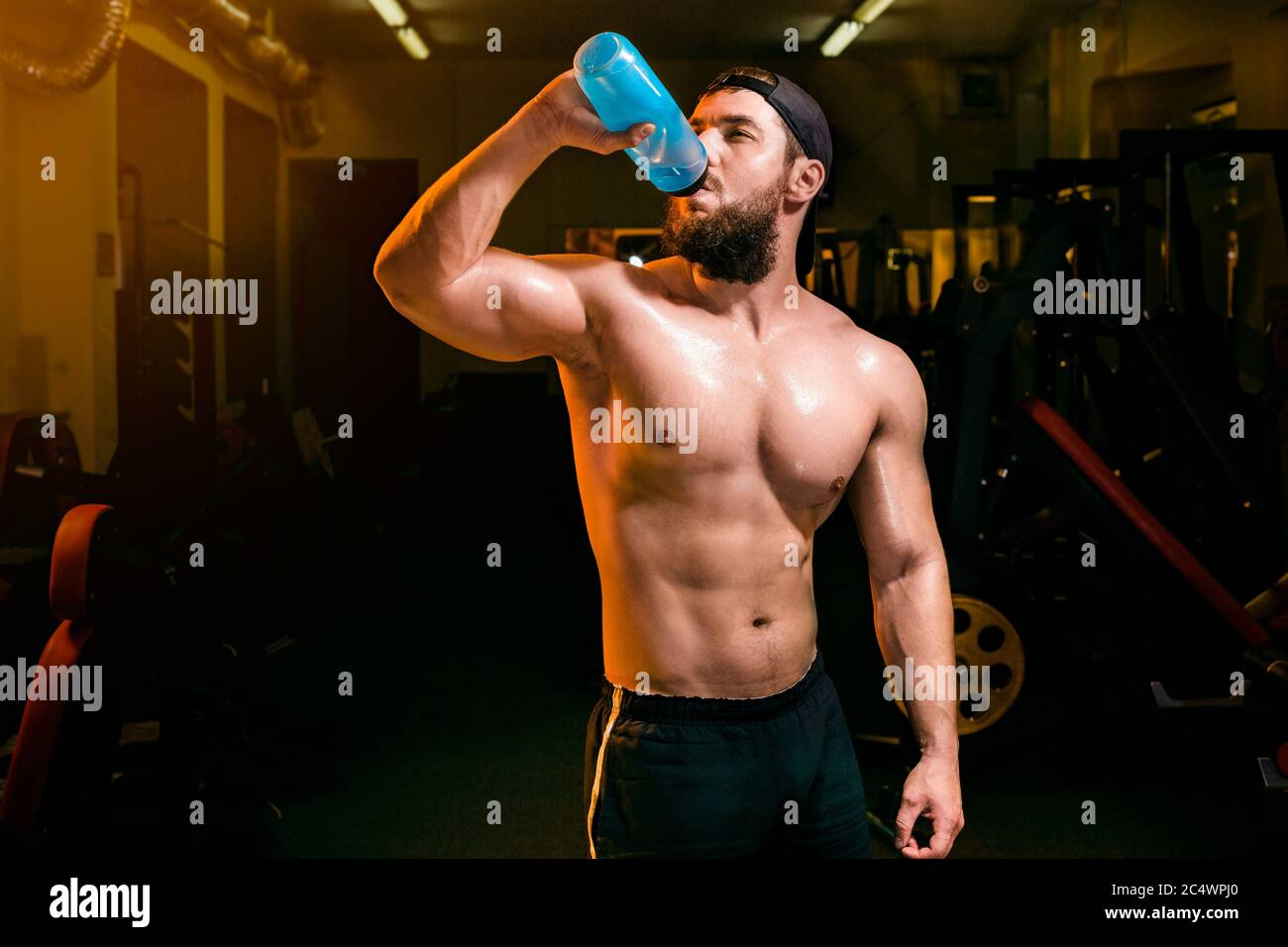 man in the gym with shaker Stock Photo - Alamy