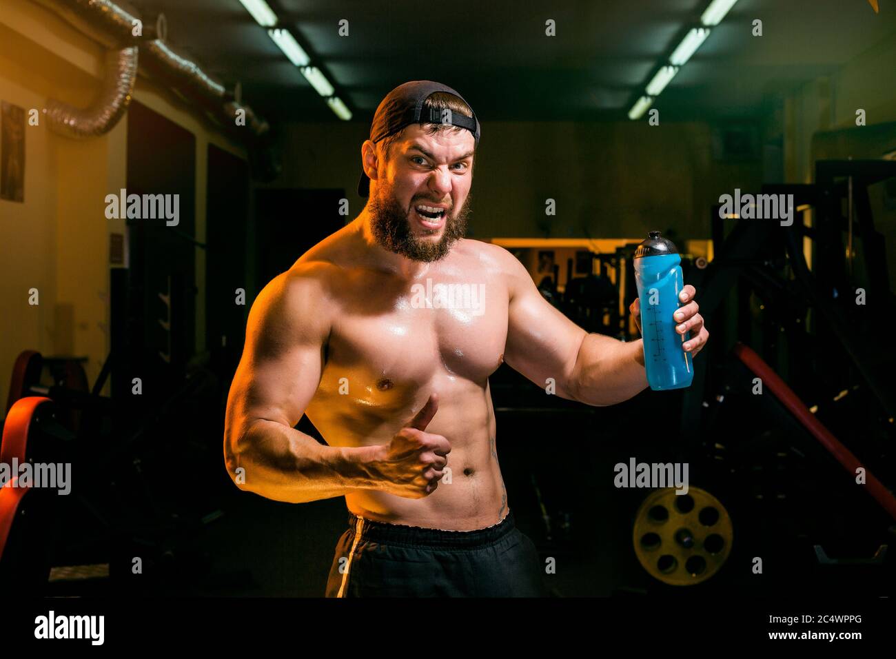 man in the gym with shaker Stock Photo - Alamy
