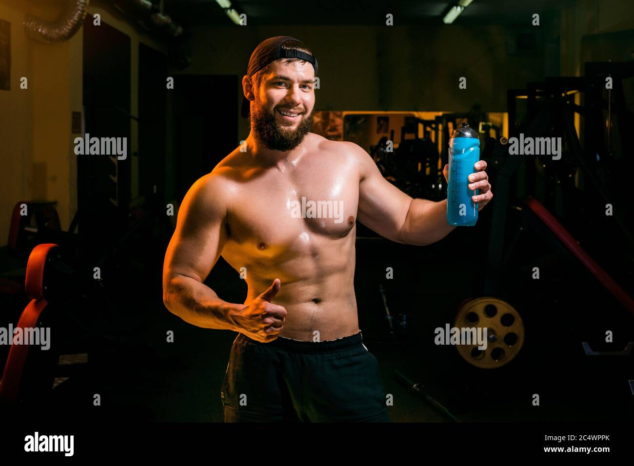 man in the gym with shaker Stock Photo - Alamy