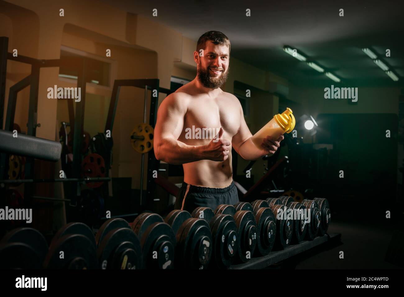 man in the gym with shaker Stock Photo - Alamy