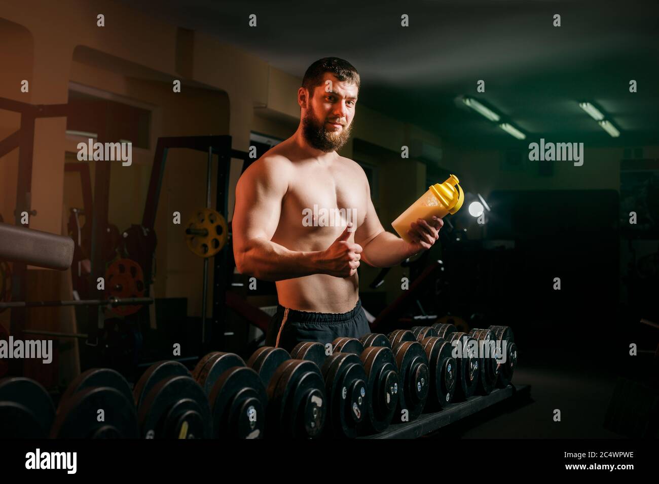 man in the gym with shaker Stock Photo - Alamy