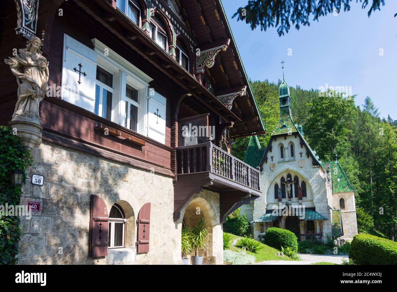 Semmering: wooden house rectory, Catholic parish church of the Holy ...