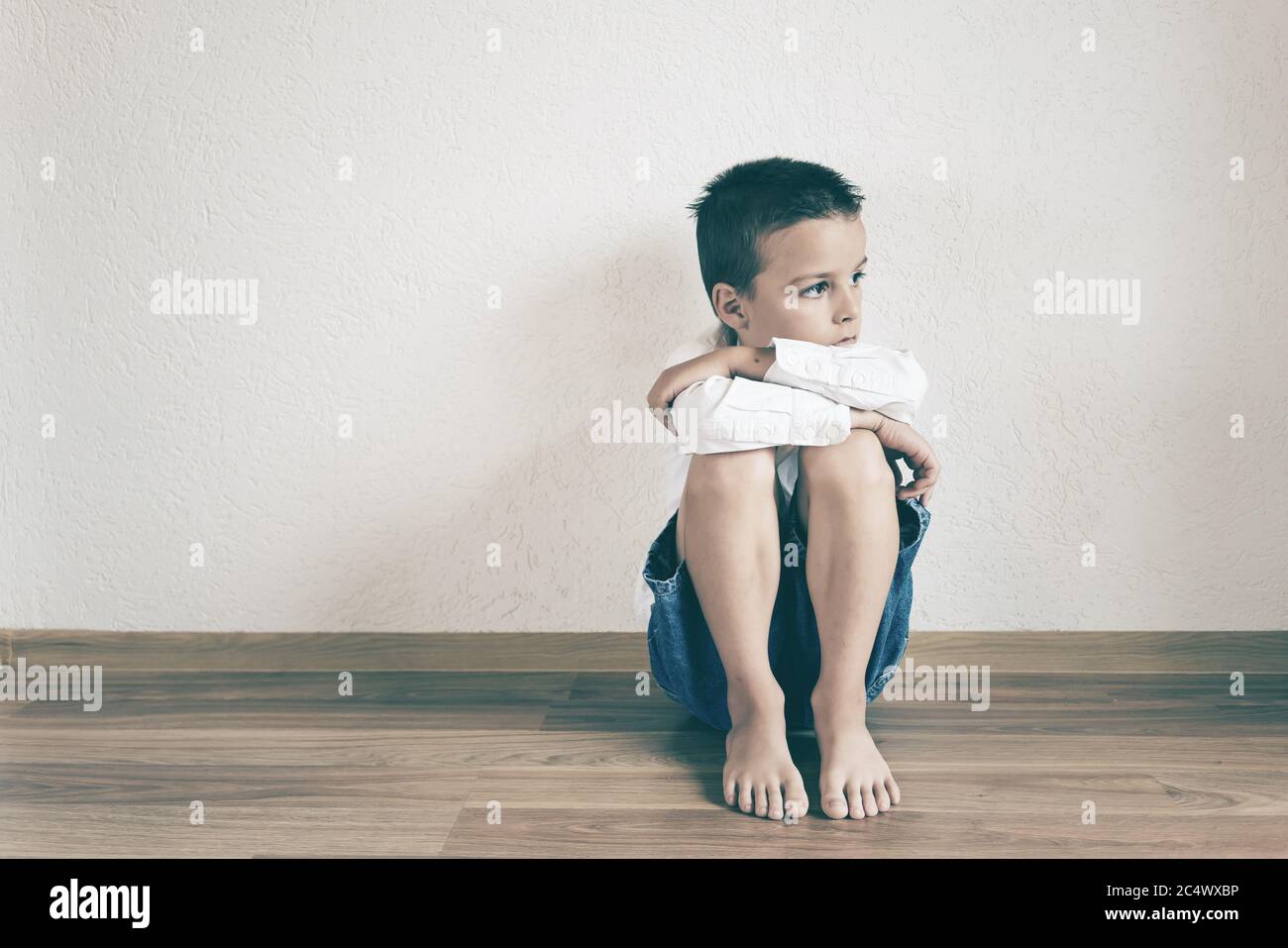 sad boy in the room Stock Photo - Alamy