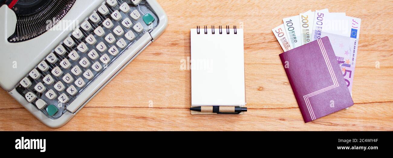old wooden background with typewriter, notepad Stock Photo - Alamy