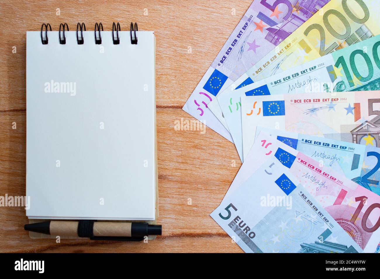 background with euro banknotes with different values and notepad Stock ...