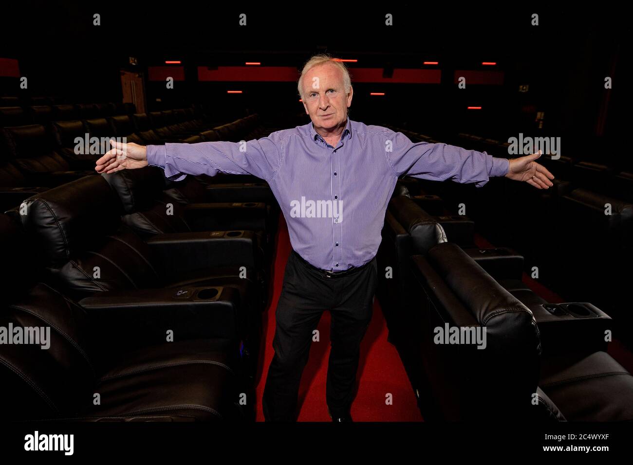 Showing distance between newly installed recliner chairs hi-res stock ...