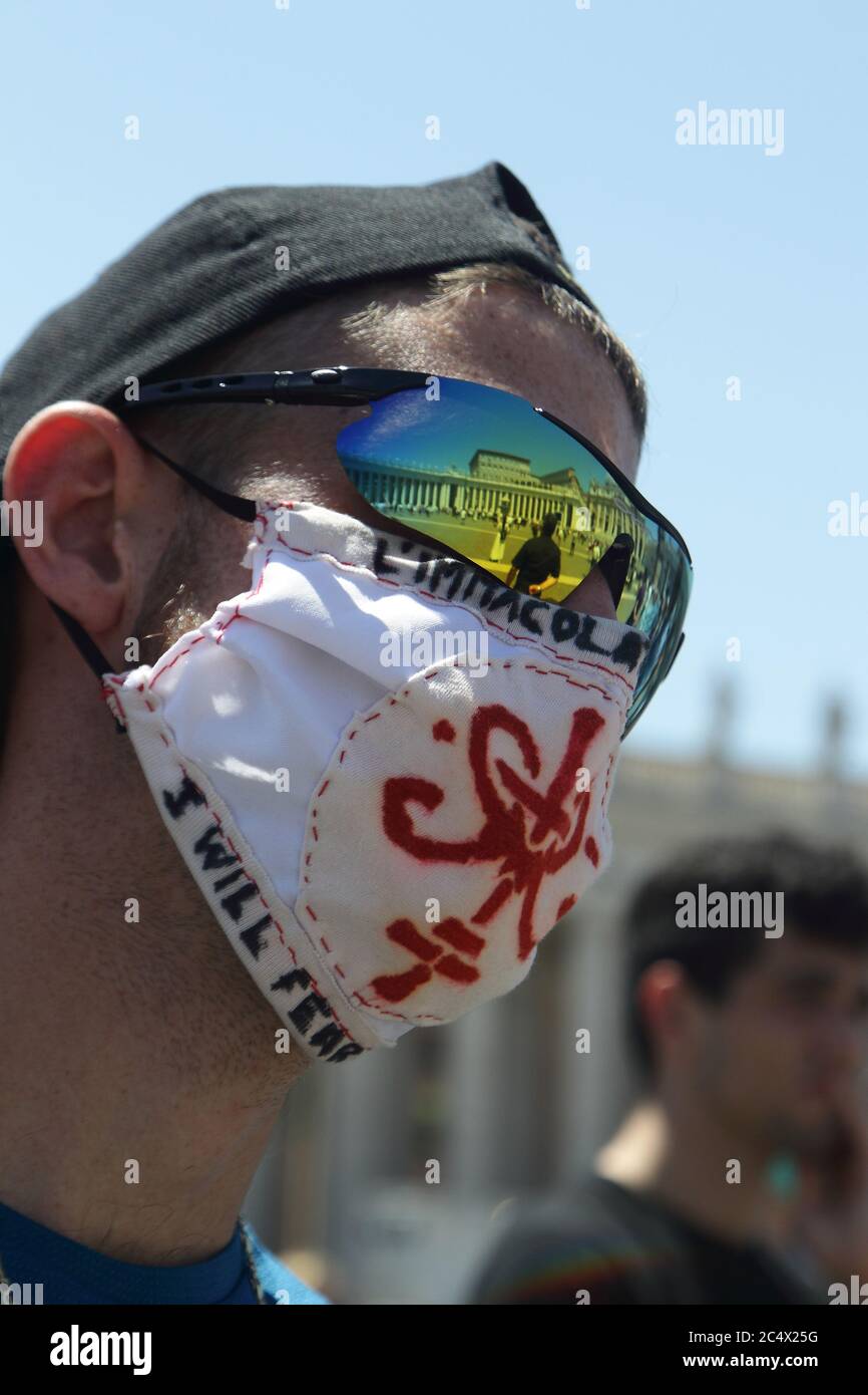 June 29, 2020 - Vatican City (Holy See) - A boys with mask during the ...