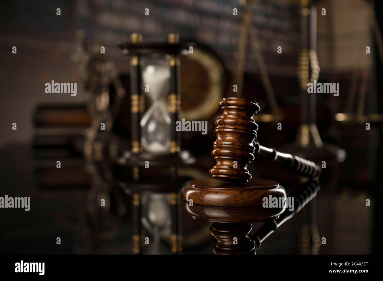 Law theme. Court library. Gavel, scale and Themis statue on brown ...