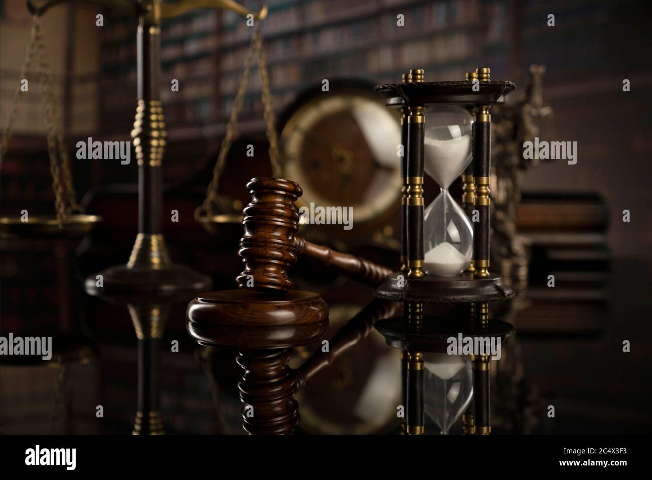 Law theme. Court library. Gavel, scale and Themis statue on brown ...
