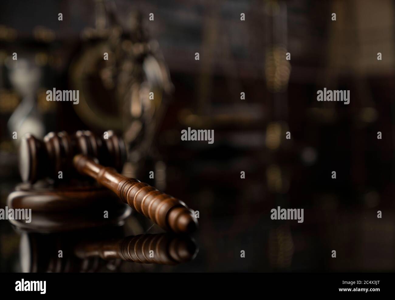 Law theme. Court library. Gavel, scale and Themis statue on brown ...