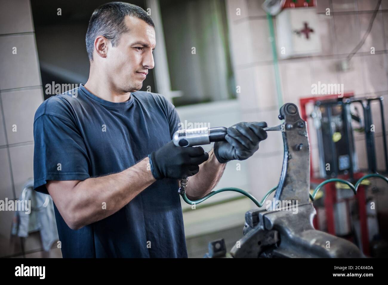 Car master mechanic working in auto vulcanizing and vehicle service ...