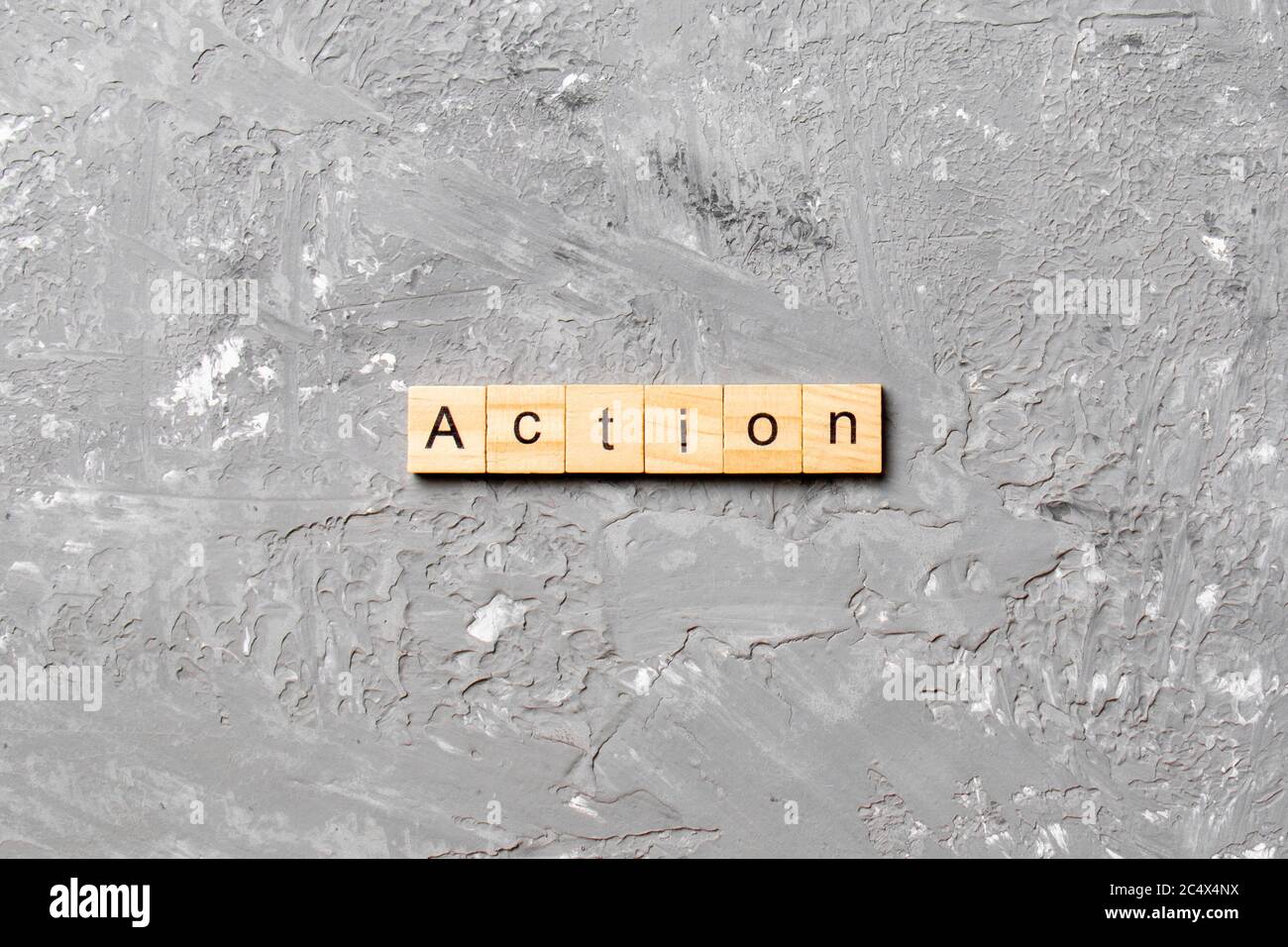 Action word written on wood block. Action text on table, concept Stock ...