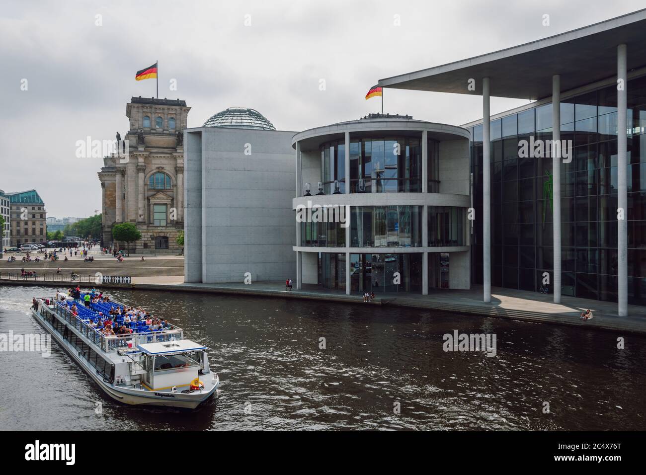Reichstag building (left) beside the river Spree and Paul Loebe ...