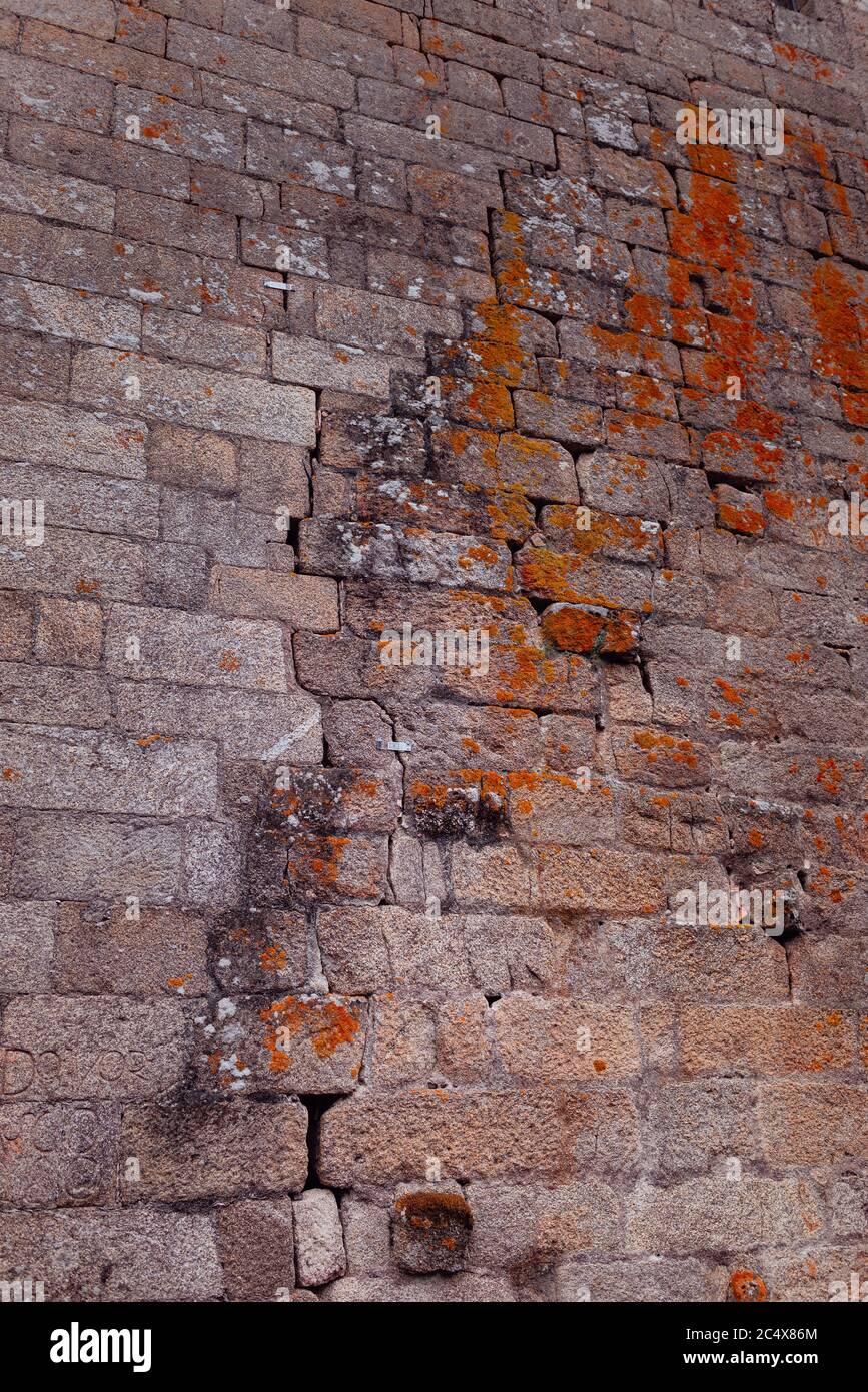 Damaged exterior wall of a medieval castle in ruins Stock Photo - Alamy