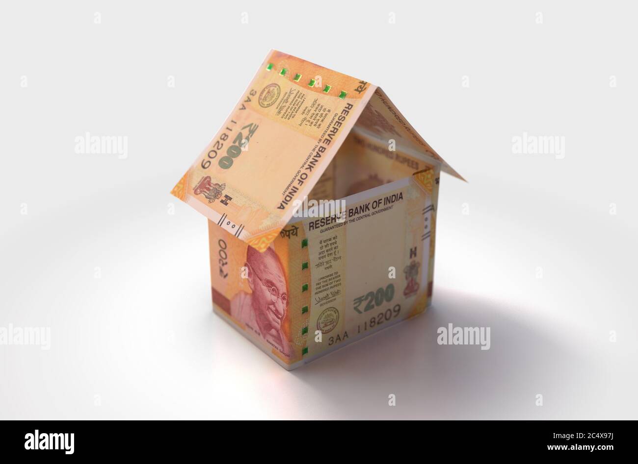 A concept of indian rupee bank notes folded into the shape of a simple ...