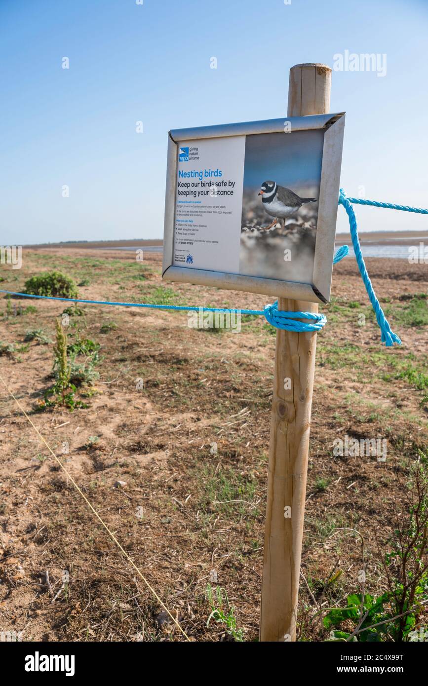 Snettisham Nature Reserve, view of an RSPB sign urging caution in the ...