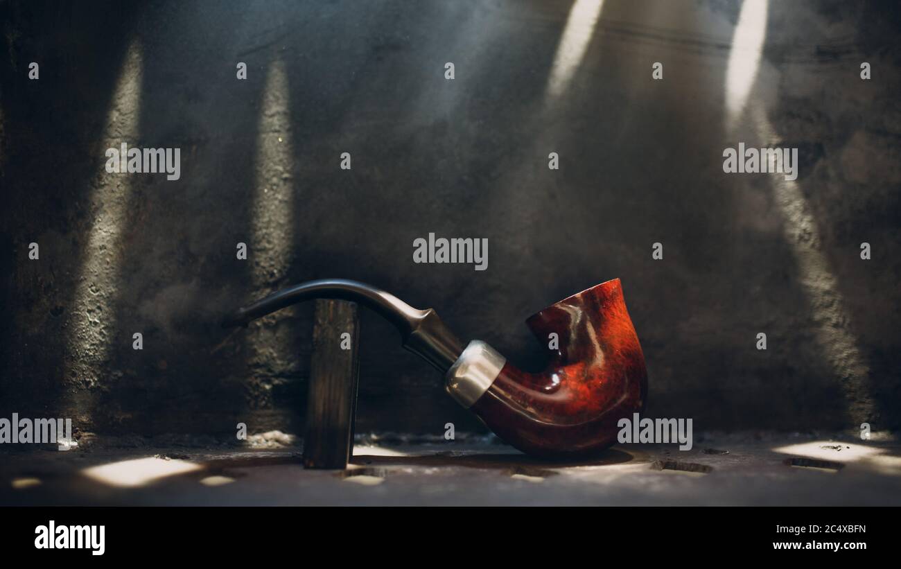 Smoking pipe on steel background with smoke Stock Photo - Alamy