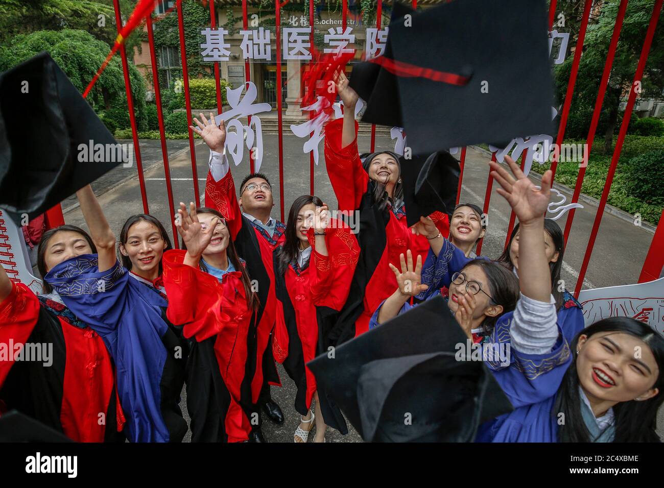 Beijing, China. 29th June, 2020. Graduates celebrate their graduation ...
