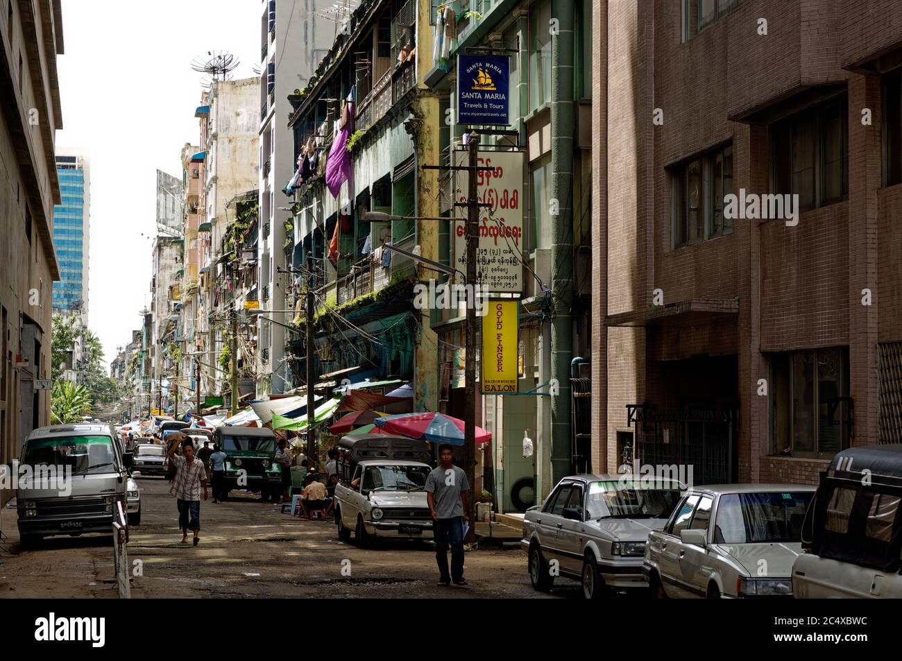 The busy bustling crowded streets of central Yangon in Myanmar ...