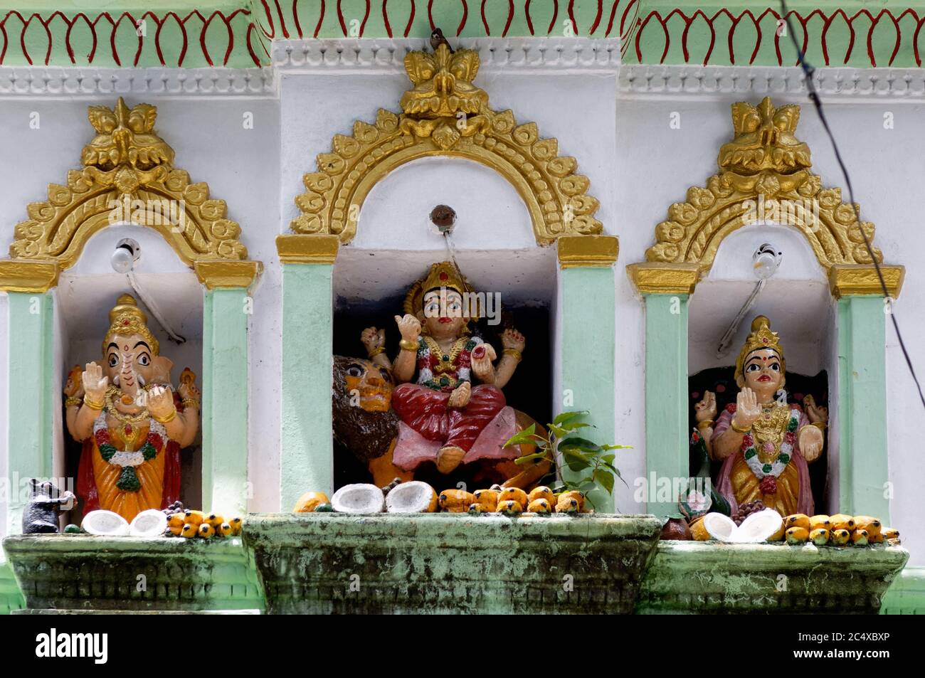 Hindu gods with puja offerings at the Shwedagon Pagoda, Yangon, Myanmar ...