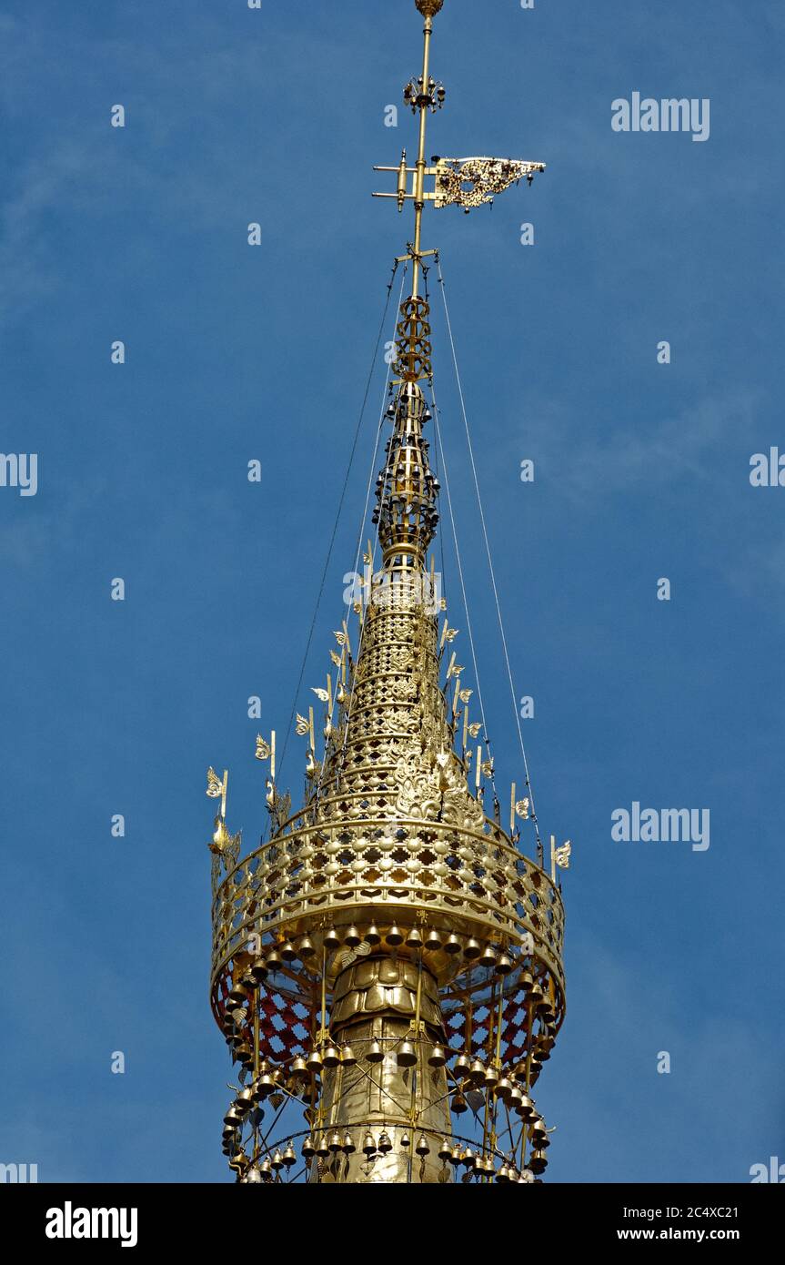 Golden turban on top of a stupa at the Shwedagon pagoda, Yangon ...