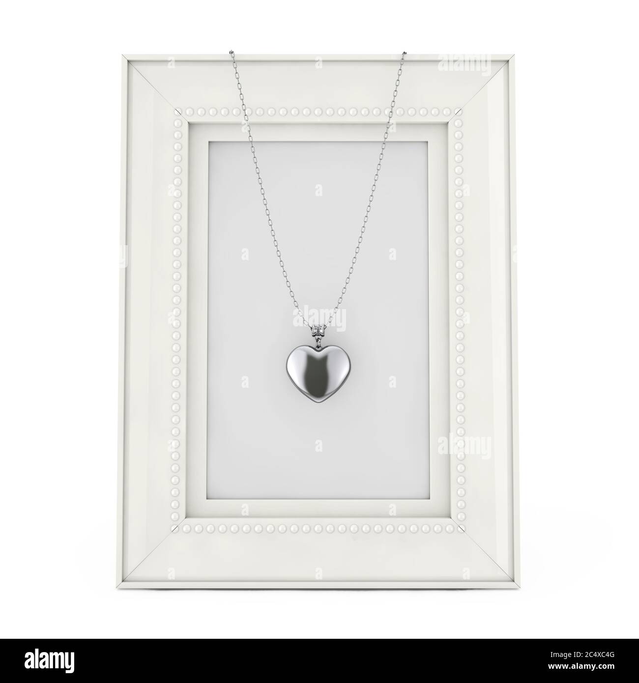 Silver Heart Medallion on Chain over Empty Photo Frame on a white ...