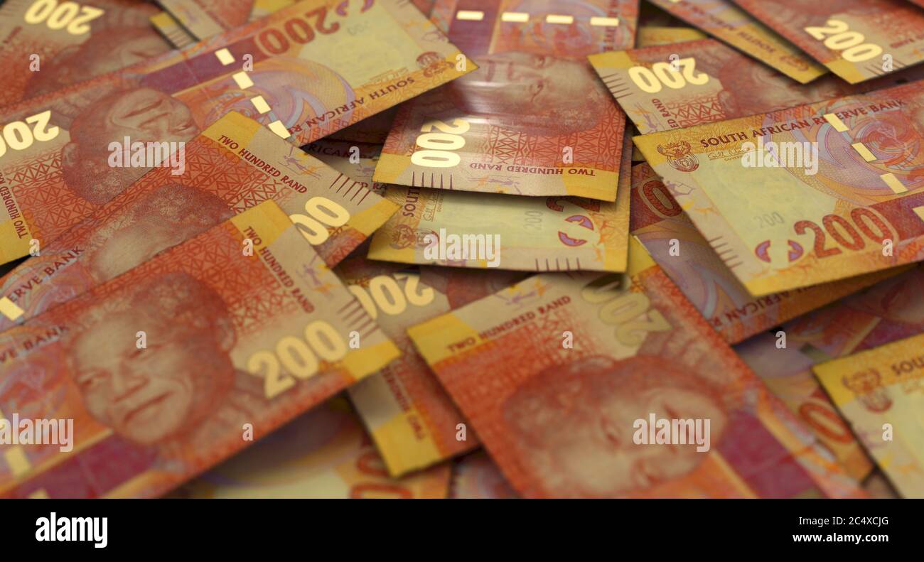 A close-up view of a scattered pile of South African Rand banknotes ...