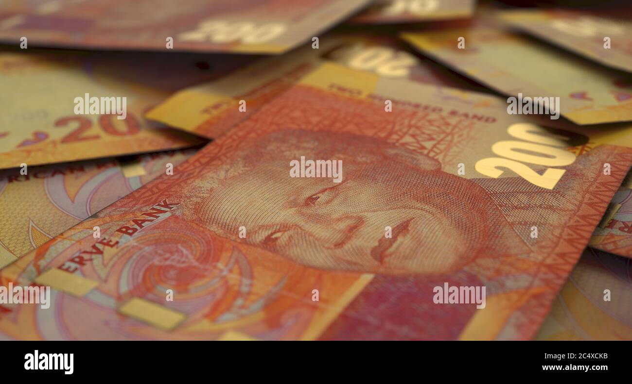 A close-up view of a scattered pile of South African Rand banknotes ...