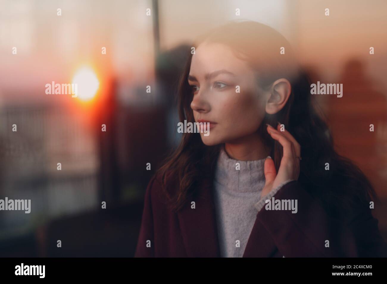 Beautiful young teenager girl portrait behind window glass Stock Photo ...