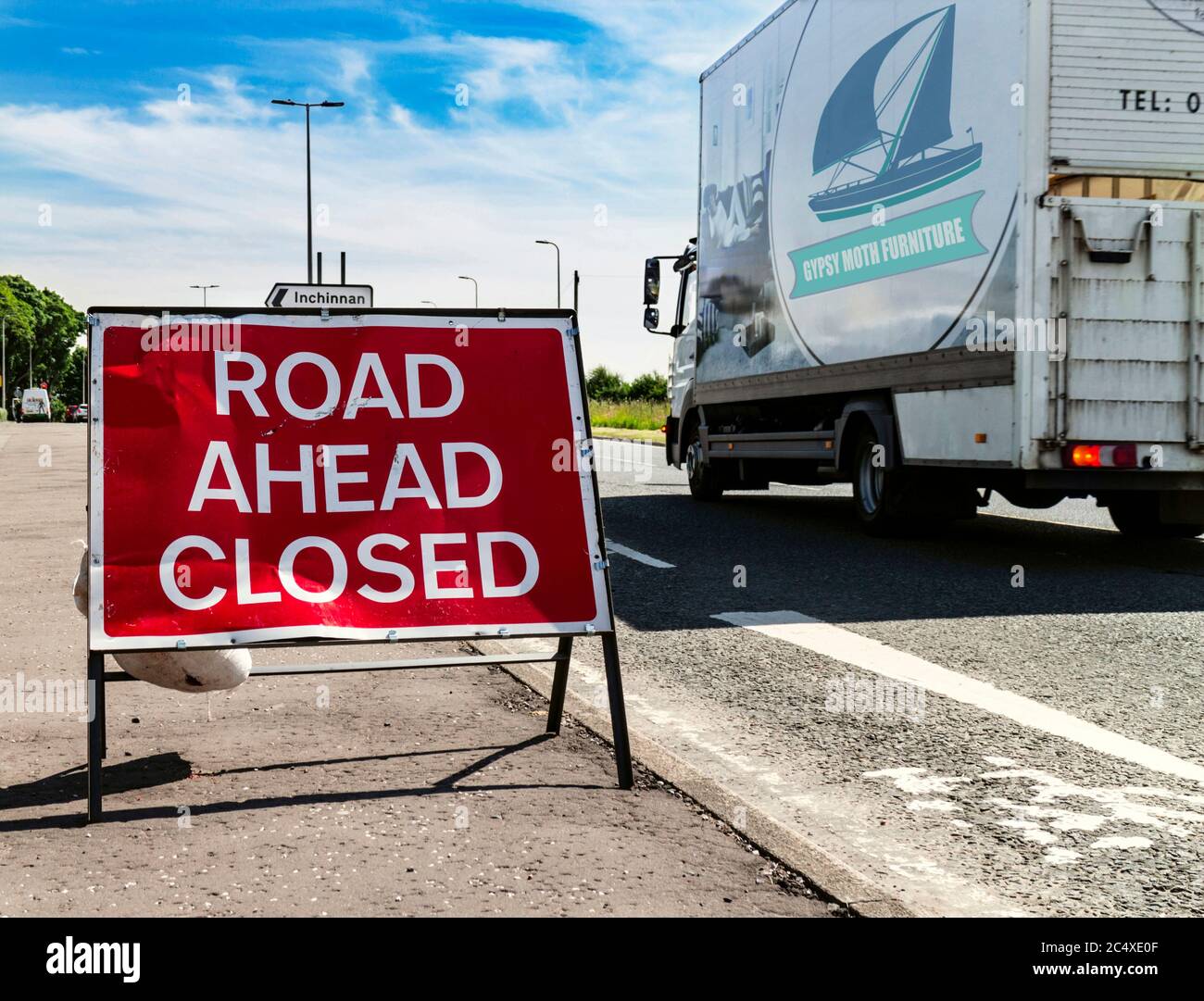 Delivery van passing a road ahead closed warning sign, Scotland Stock ...