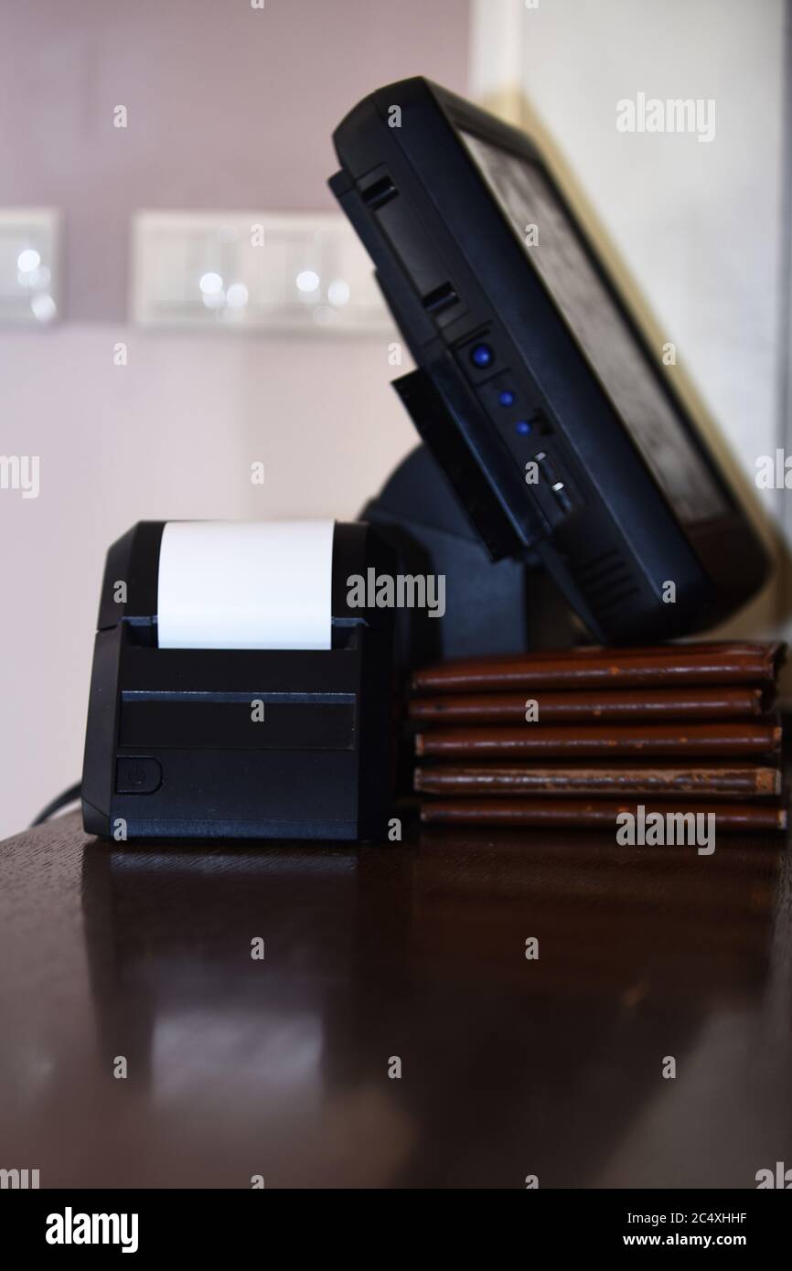 Cash counter and cashier machine on table. Credit card payment and bill ...