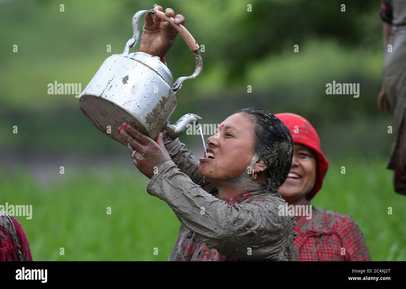 Kathmandu, Nepal. 29th June, 2020. A Nepali woman drinks local wine ...
