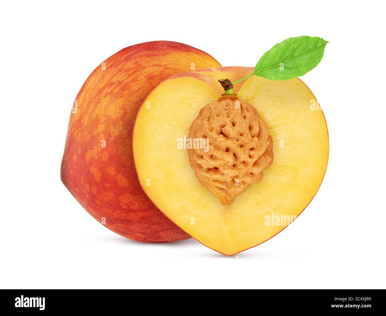 Half and whole of peaches with seed and green leaf. Isolated on white ...