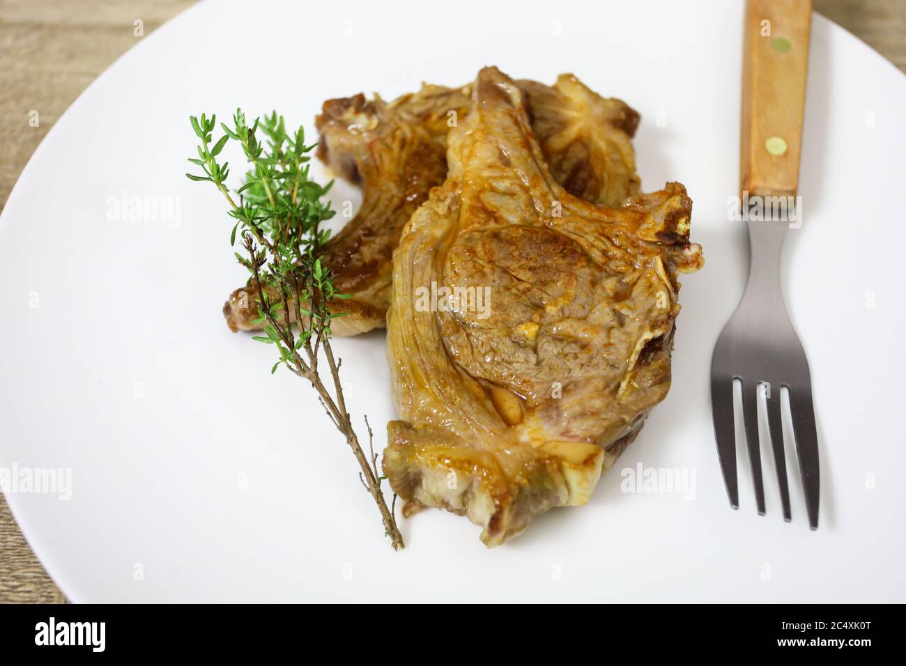 lamb chops on a plate Stock Photo - Alamy