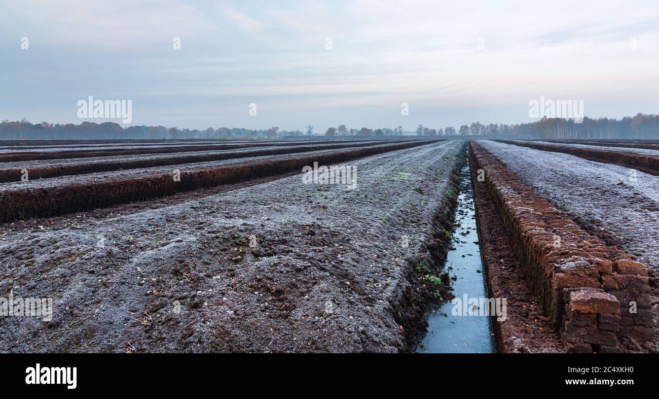 Sunrise at a peat excavation site in Northwestern Germany Stock Photo ...