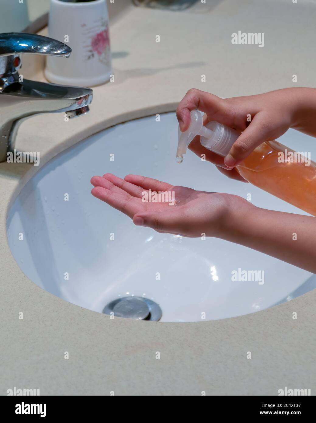 Child Soap Dispenser High Resolution Stock Photography and Images - Alamy