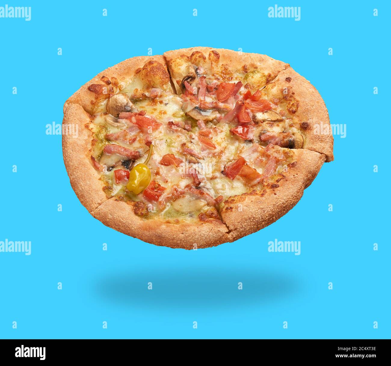 Pizza on a blue background with clipping path Stock Photo - Alamy