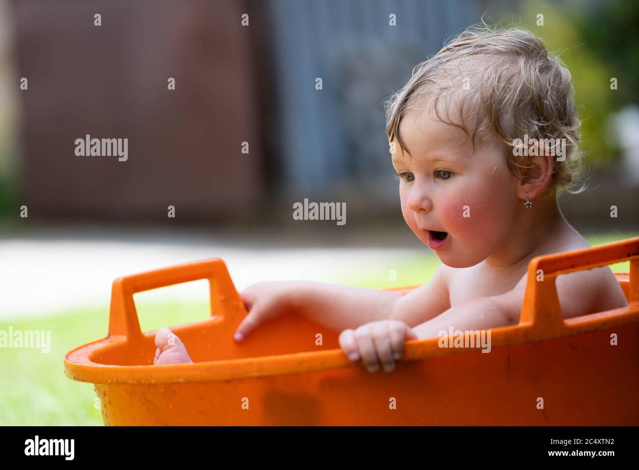 Girl child bathe water hi-res stock photography and images - Alamy
