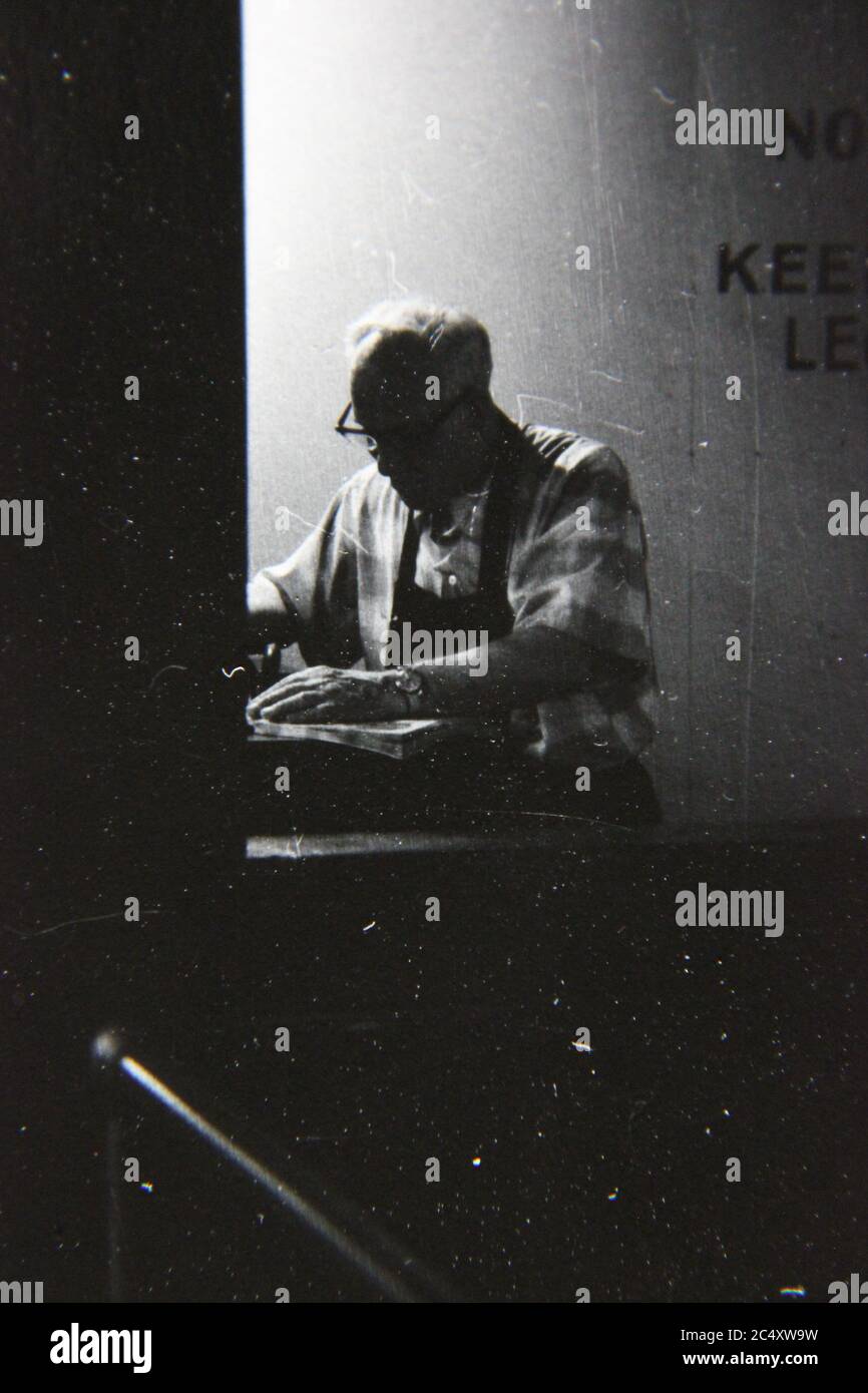 Fine 70s vintage black and white photography of a carny worker amidst ...