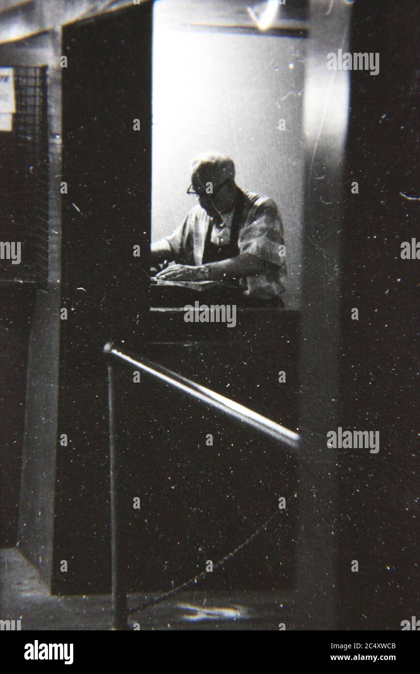 Fine 70s vintage black and white photography of a carny worker amidst ...