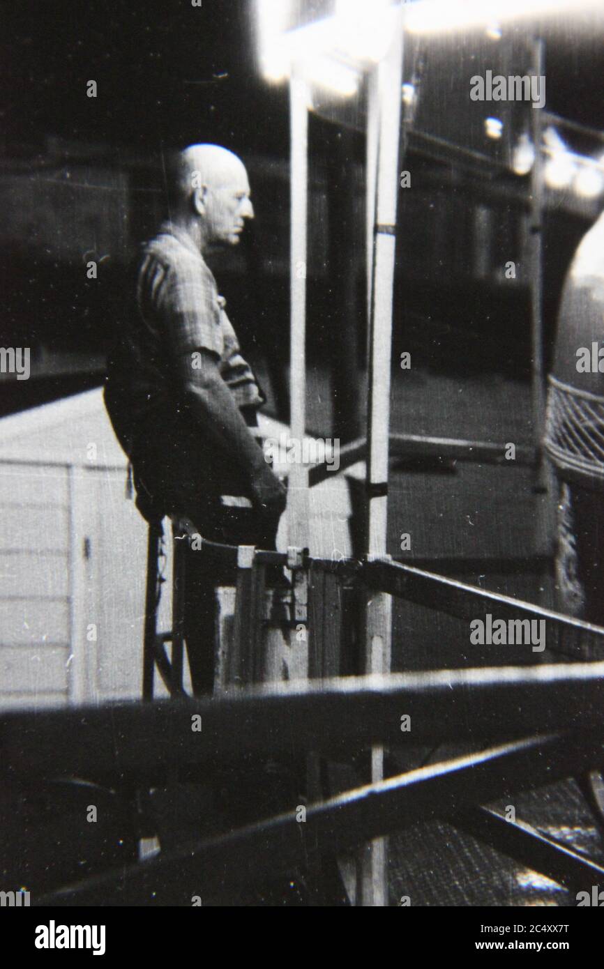 Fine 70s vintage black and white photography of a carny worker amidst ...
