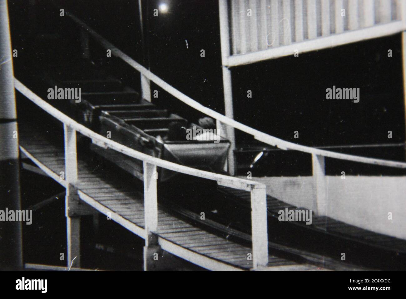Fine 70s vintage black and white photography of a roller coaster ride ...