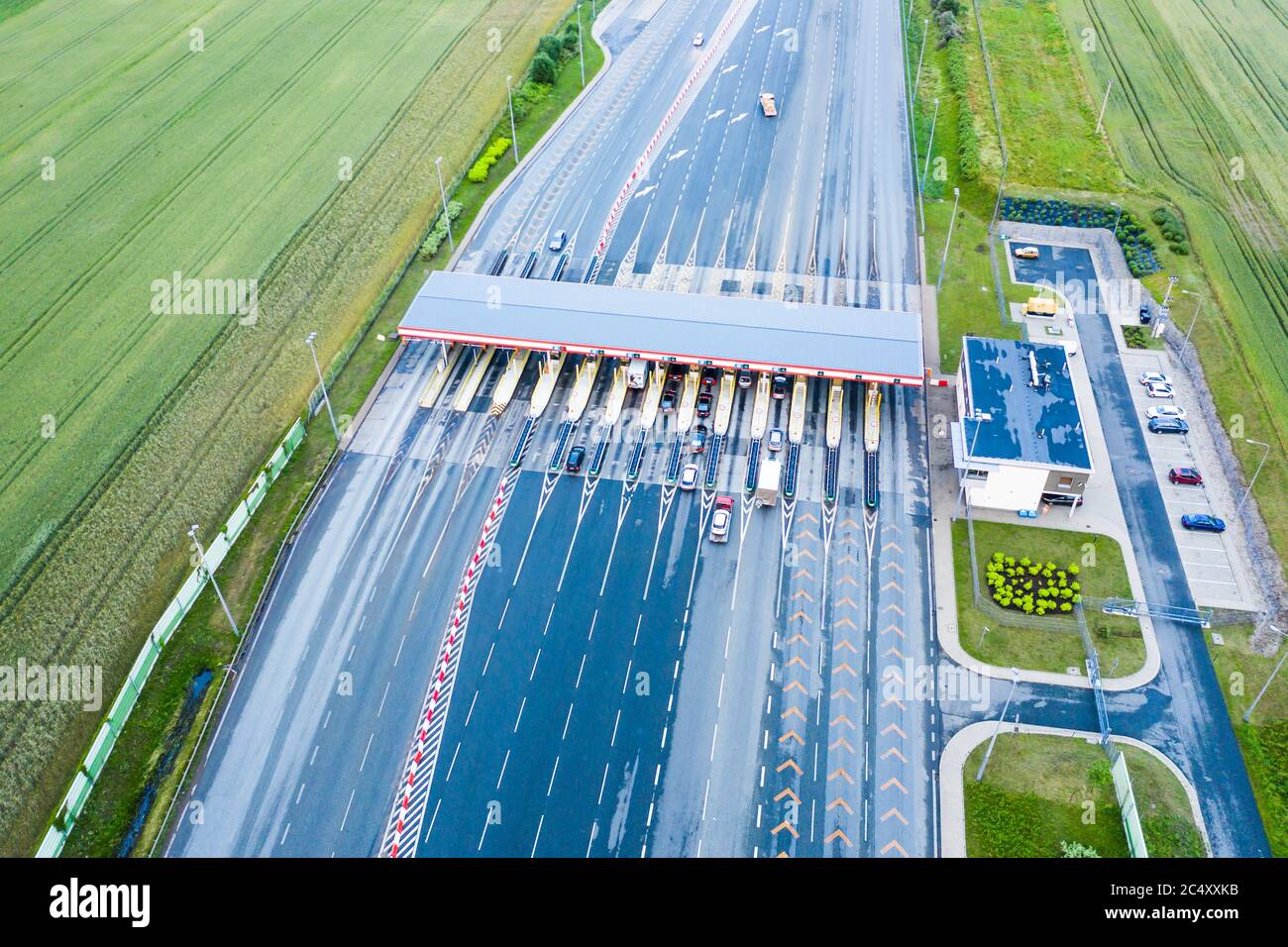 Car traffic transportation on multiple lanes highway road and toll ...