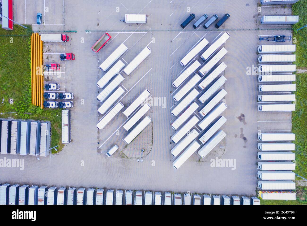 Aerial top view of white cargo trailer parking, trailer line up ...