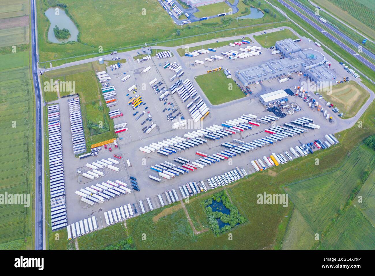 Aerial Top View of White Semi Truck with Cargo Trailer Parking lot ...