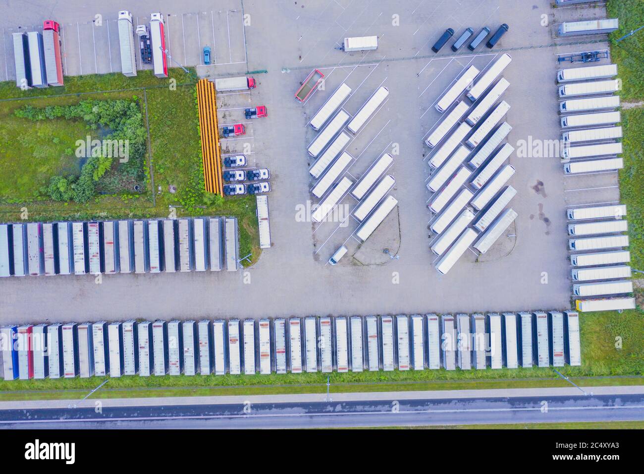 Aerial top view of white cargo trailer parking, trailer line up ...